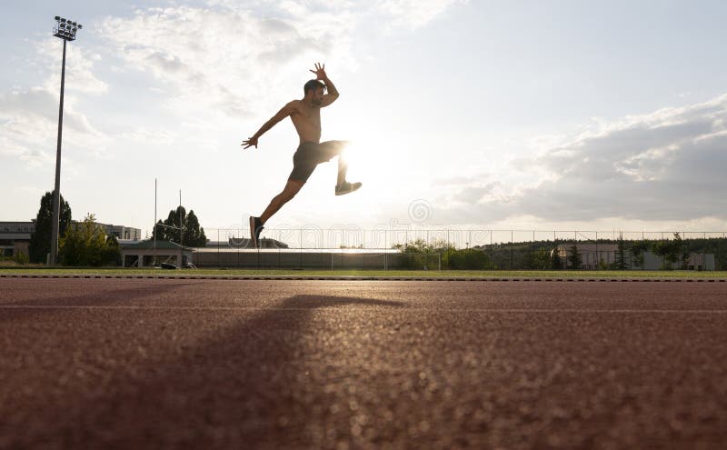 Athlete Who Long Jumps and Jumps High Stock Photo - Image of exercising ...