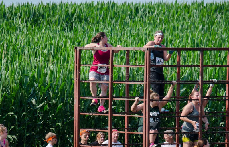 Athletes Climb Over Obstacles Editorial Stock Image - Image of ...
