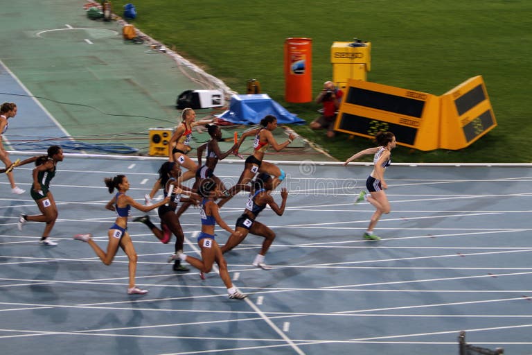 Athletes Compete in the 4x100 Relay Race Editorial Photography - Image ...