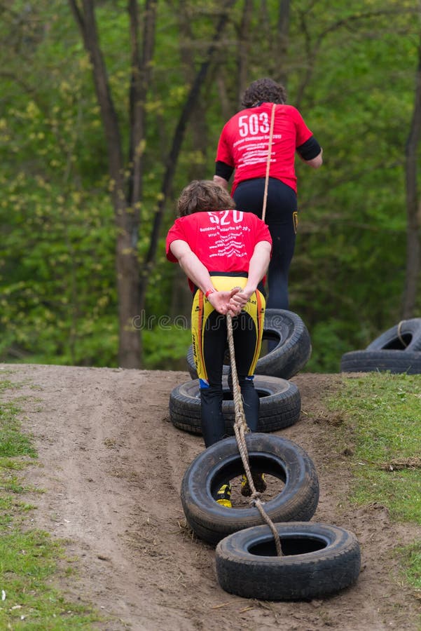 Athletes Doing a Survival Run Editorial Photography - Image of race ...