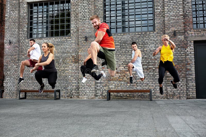 Athletes Jumping during a Workout Session Stock Image - Image of ...