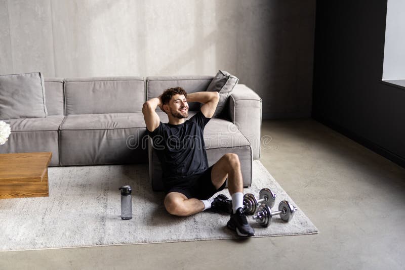 Athletes Young Man are Resting after Exercising at Home Stock Image ...