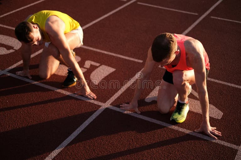 Athletes Run in the Stadium Preparing for Competitions Stock Photo ...