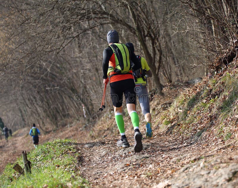 Athletes Running the Country Race in the Mountain Trail Stock Photo ...