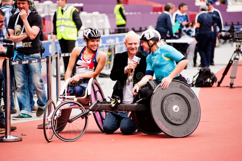 Athletes on Wheelchairs in the Olympic Stadium Editorial Image - Image ...