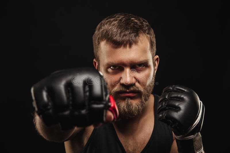 Athletic Bearded Boxer with Gloves on a Dark Background Stock Image ...