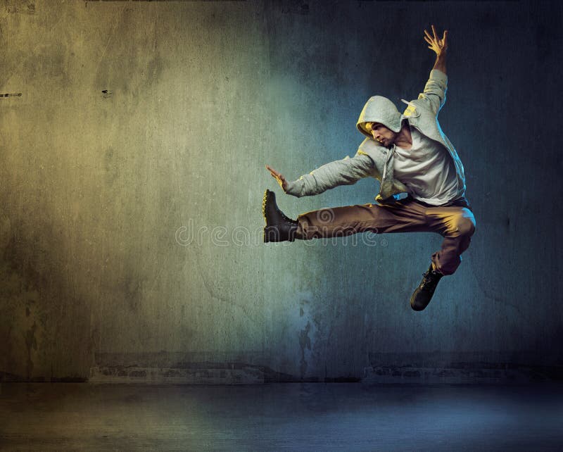Athletic Dancer Leaping through the Air in Pose Stock Image - Image of ...