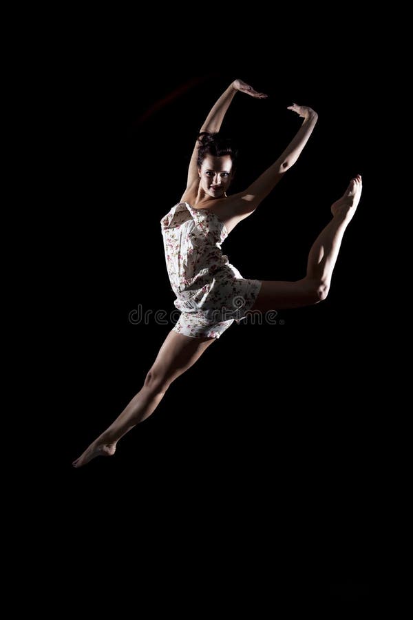 Athletic Dancer Leaping through the Air in Pose Stock Image - Image of ...