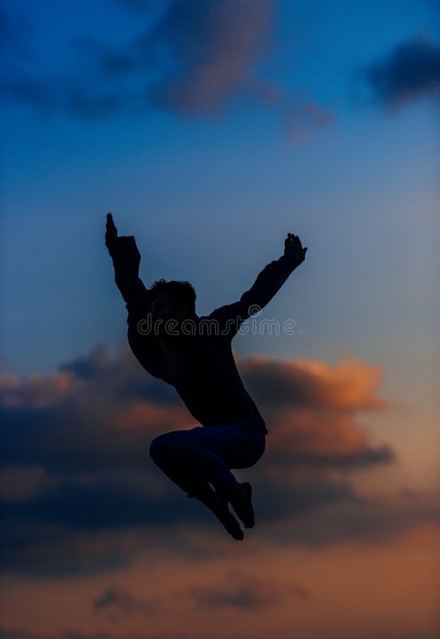 Athletic Dancer in a Super Jumping Pose Stock Photo - Image of dramatic ...