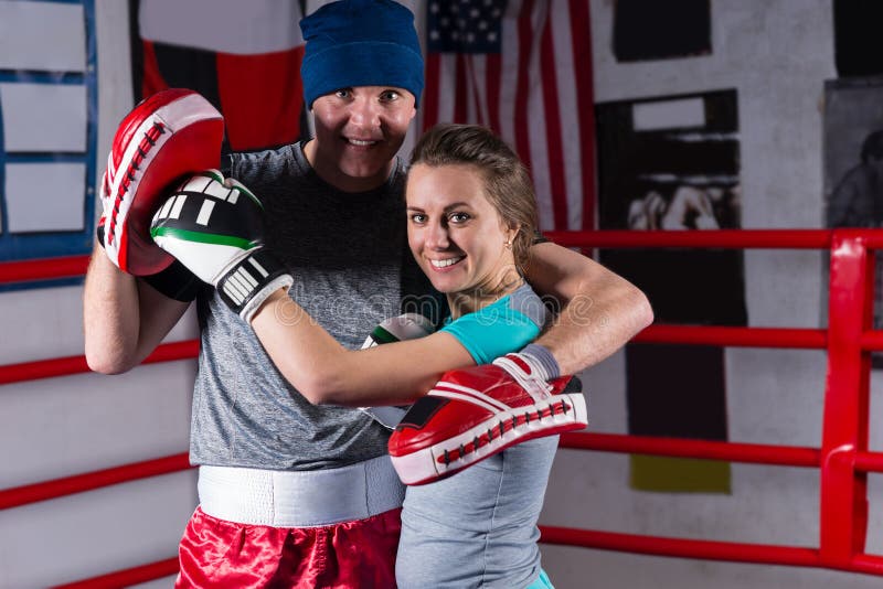 Athletic Female Hugs Her Coach in Regular Boxing Ring Stock Photo ...