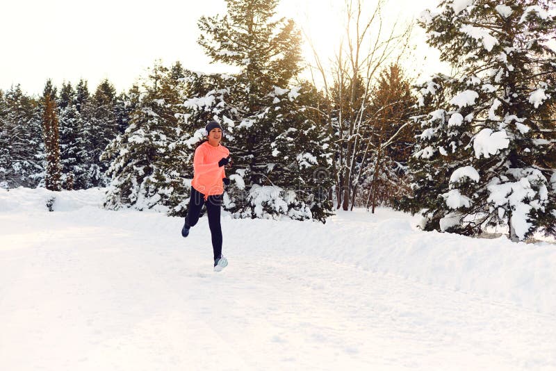 Girl Jogging in the Snow on the Nature in Winter Stock Image - Image of ...