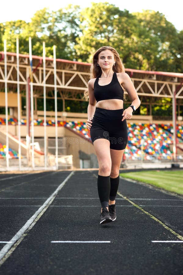 Young Athletic Running Girl on the Track Stock Image - Image of running ...