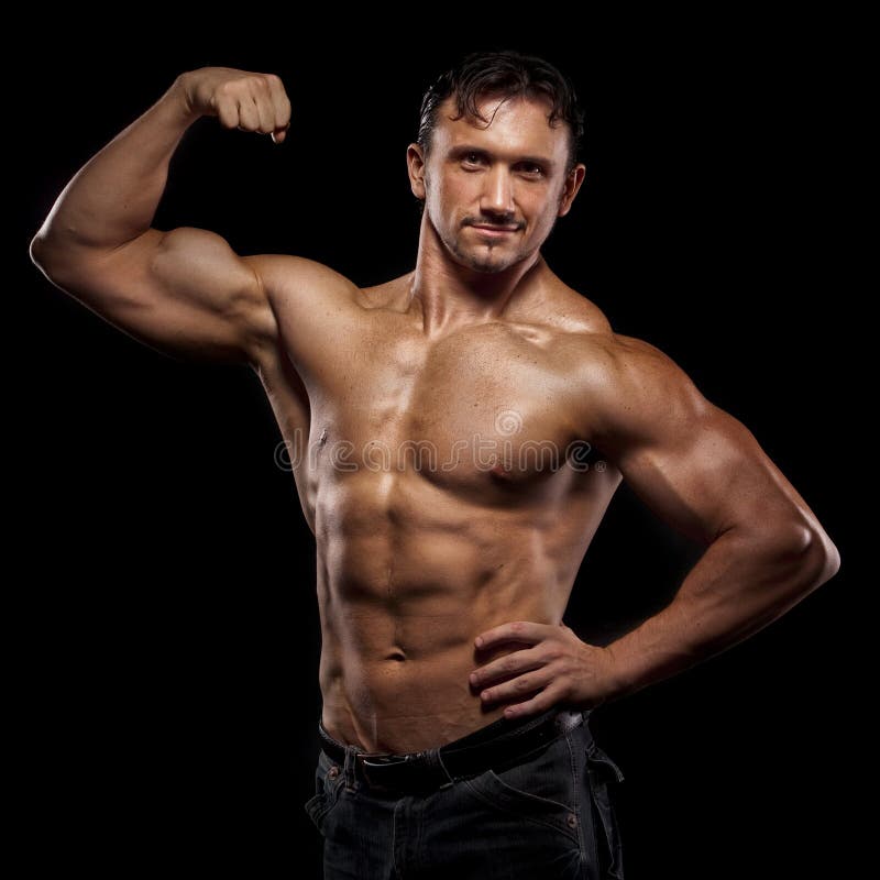 Strong Athletic Man on Dark Background Stock Image - Image of muscle ...