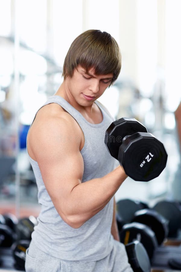 Athletic man stock photo. Image of dumbbells, effort - 29435508