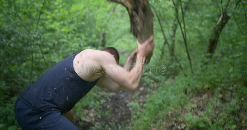 Athletic Man Beating Ground with Log Stock Video - Video of caucasian ...