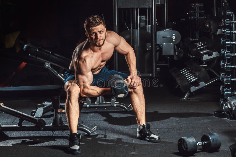 Athletic Man Bodybuilder Execute Exercise with Dumbbells for Biceps ...