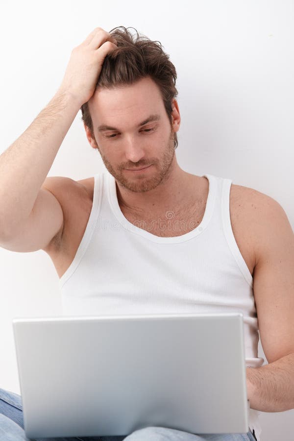 Athletic Man Browsing Internet on Laptop Stock Image - Image of leisure ...