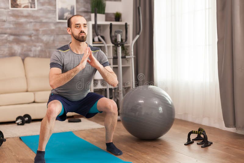 Athletic Man Doing Squats for Legs Stock Photo - Image of adult, squats ...