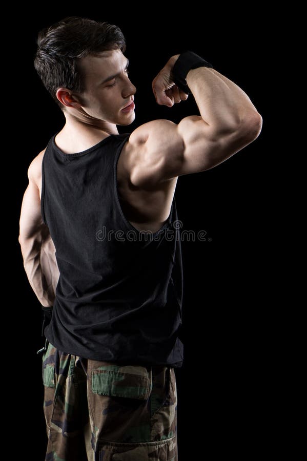 Athletic Man Flexing stock image. Image of shot, shape - 76391679