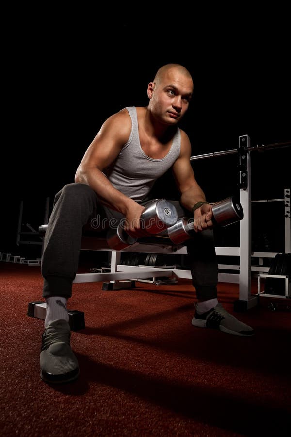 Athletic Man Lifting Weights Stock Image - Image of muscles, lifting ...