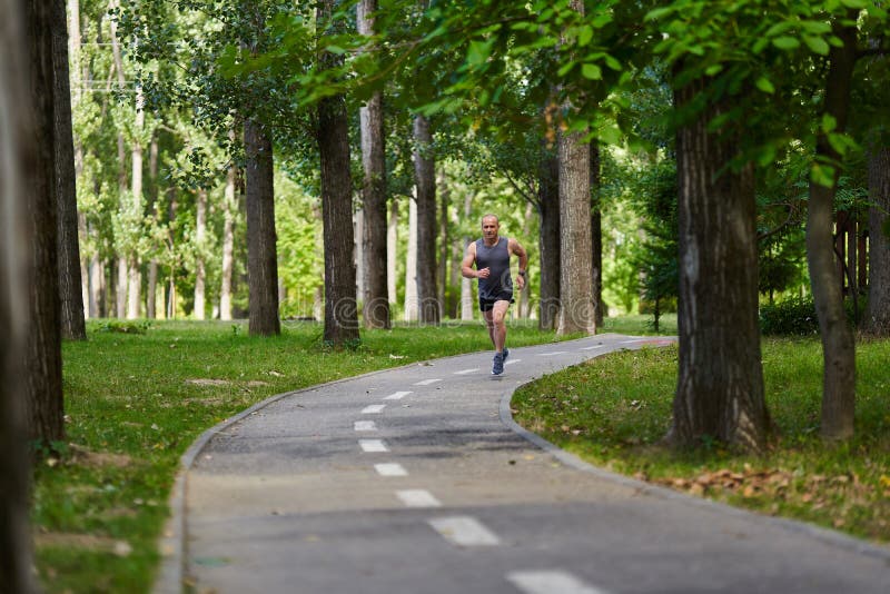 Marathon Runner Training in the Park Stock Image - Image of adult ...