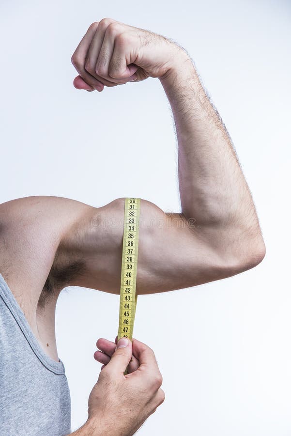 Athletic Man Measuring His Biceps Size Stock Image - Image of measuring ...