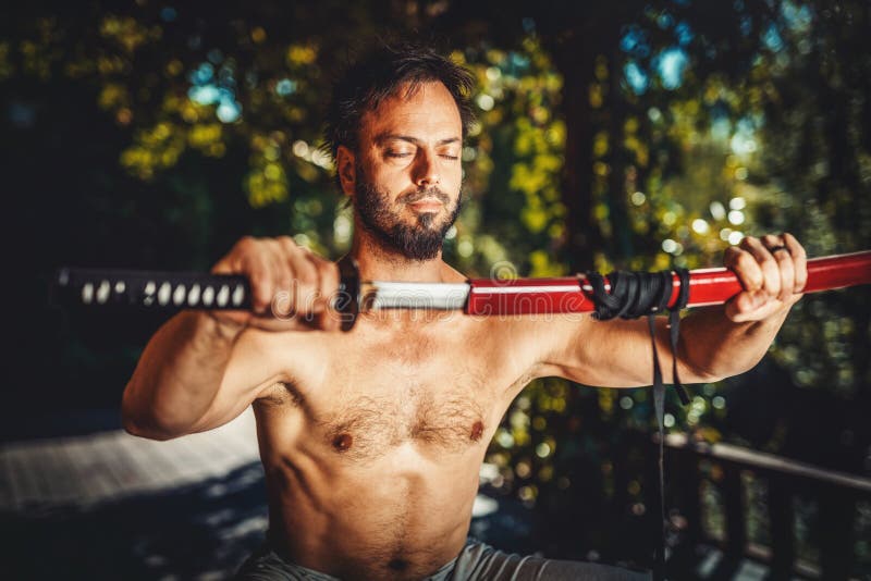 Athletic Man Practicing with a Sword. Stock Photo - Image of charm ...