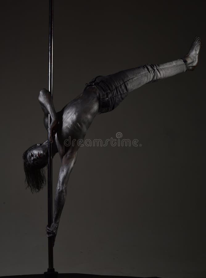 Athletic Man on Pylon. Athletic Man with Silver Painted Body. Stock ...
