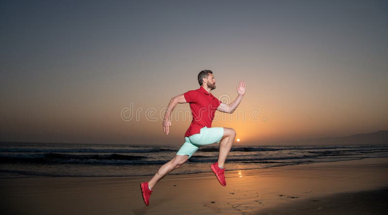 Athletic Man Runner Running on Sunset Summer Beach, Challenge Stock ...