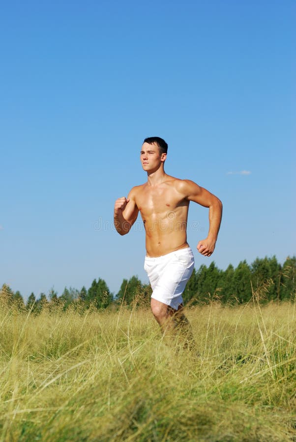 Athletic Man Running in Outdoor Scene Stock Image - Image of jogging ...