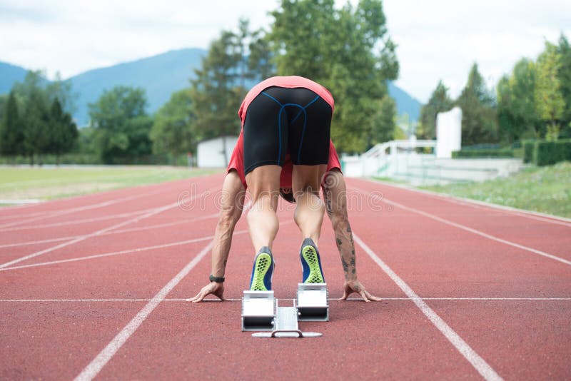 Male Sprinter Getting Ready To Start the Race Stock Image - Image of ...