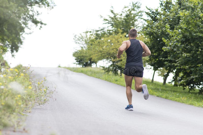 Athletic Man Running Uphill, Outdoor. Stock Image - Image of uphill ...