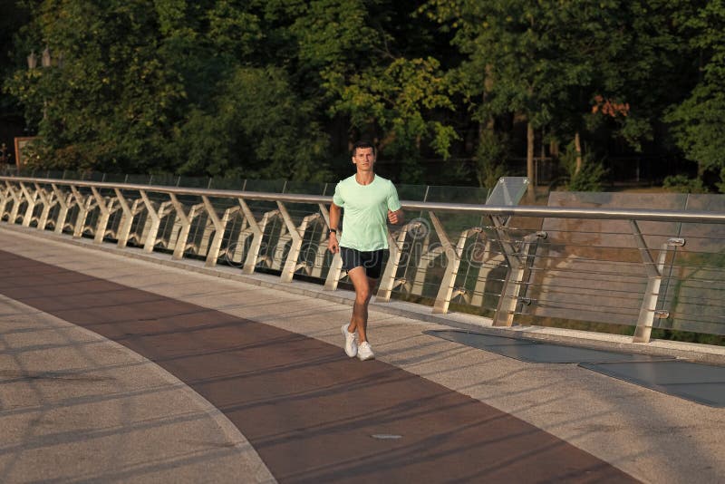 Athletic Man Sprinter Running in Sportswear Outdoor Stock Photo - Image ...