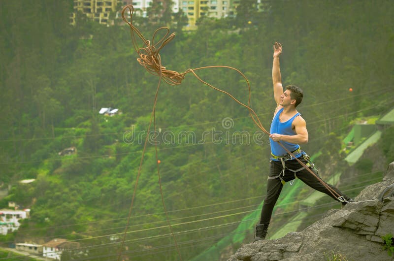 Climber throwing his rope stock image. Image of sport - 17605725