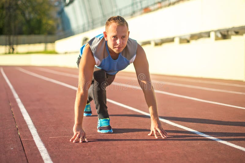 Athletic Man Standing in Posture Ready To Run on Stock Photo - Image of ...