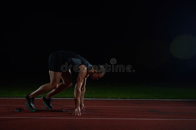 Athletic man start stock photo. Image of determined, footplates - 54678780