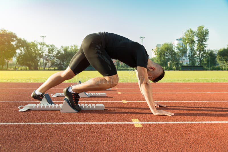 Athletic Man Starting Jogging in Sun Rays Stock Photo - Image of games ...
