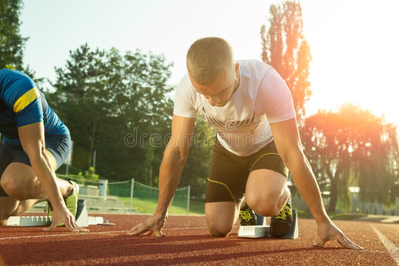 Athletic Man Starting Jogging in Sun Rays Stock Photo - Image of ...