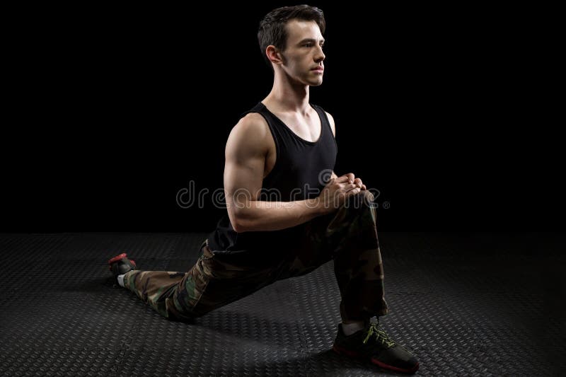 Athletic Man Stretching stock photo. Image of legs, stretch - 76391660