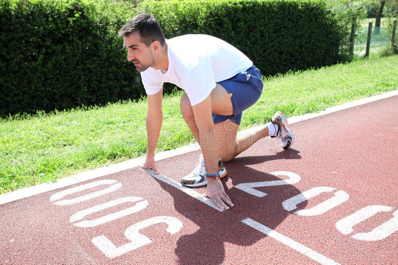 Athletic Man on Track Starting To Run Stock Image - Image of people ...