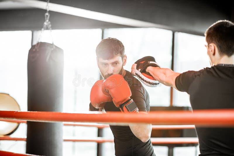 Man Training with Boxing Coach on the Boxing Ring Stock Image - Image ...