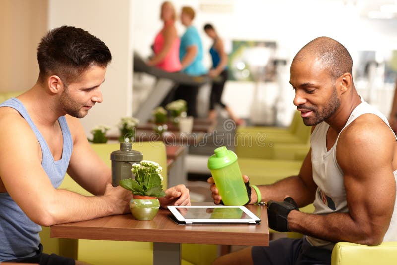 Athletic Men in Gym Having Break Stock Image - Image of brown, chat ...