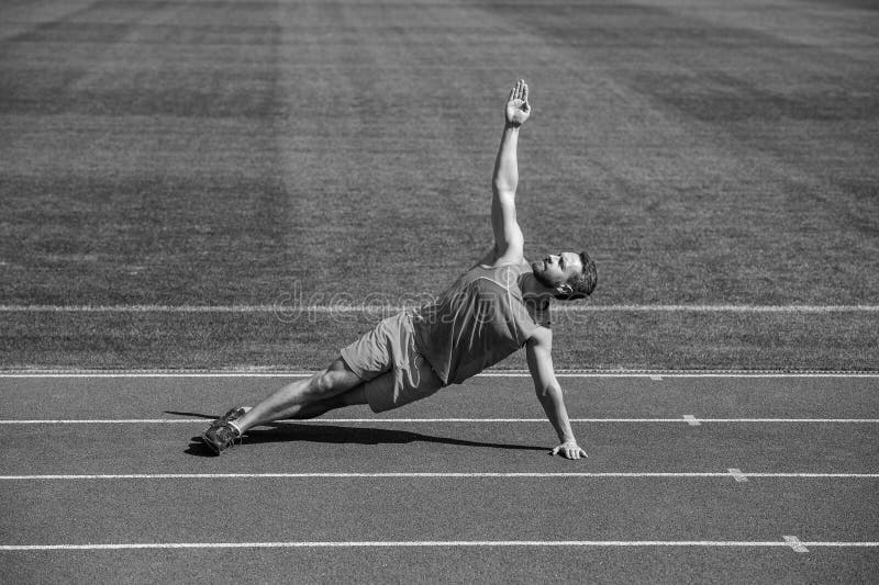 Athletic Muscular Man Warming Up before Training, Yoga Stock Photo ...