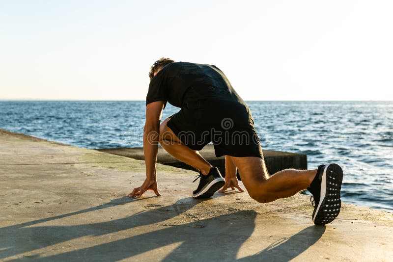 Athletic Sprint Runner in Start Position for Run Stock Image - Image of ...