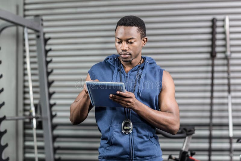 Athletic Trainer Using Digital Tablet Stock Photo - Image of athletic ...