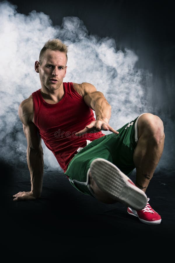 Athletic Trendy Handsome Fit Young Man in a Hat Doing a Break Dance ...