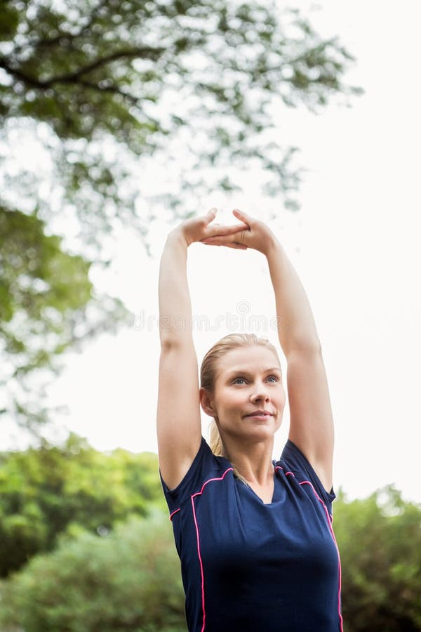 Athletic Woman Doing Arms Stretching Stock Image - Image of outdoors ...