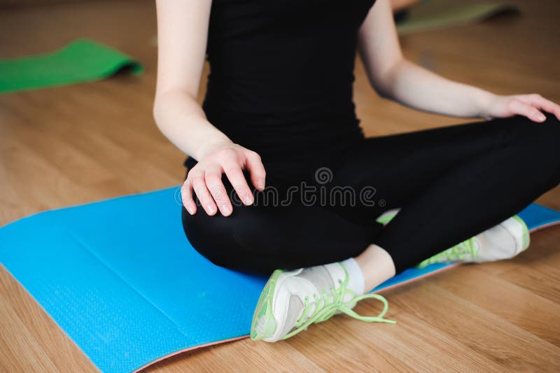 Athletic Woman Doing Relaxation Exercises in Gym Class. Stock Image ...