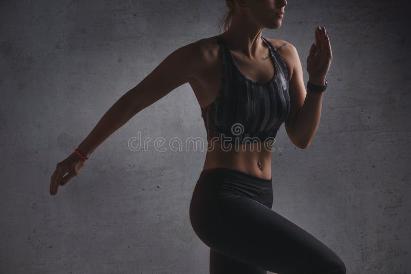 Athletic Woman Running Forward in the Studio Stock Image - Image of ...