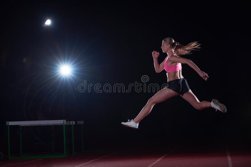 Athletic Woman Running on Track Stock Photo - Image of energy, leisure ...